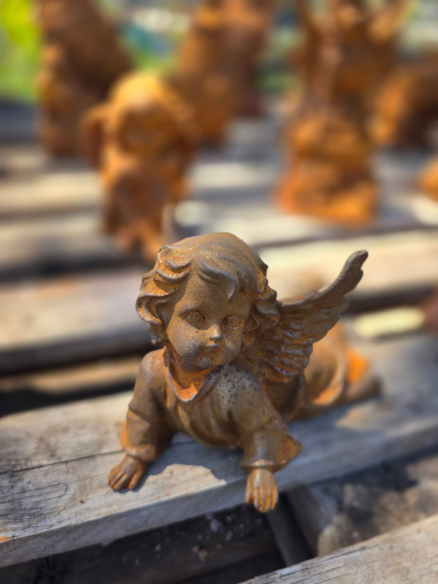 Small Steel Statue – Bottle Tree Cafe Garden and Aquarium